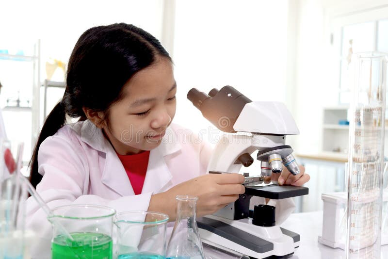 Adorable Schoolgirl in Lab Coat Doing Science Experiments, Young ...