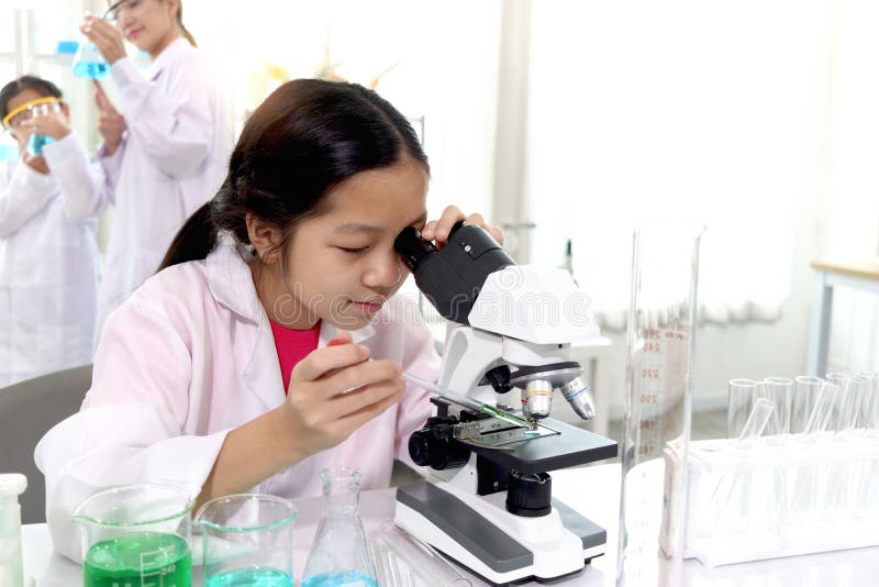 Student and Teacher in Lab Coat Have Fun Together while Learn Science ...