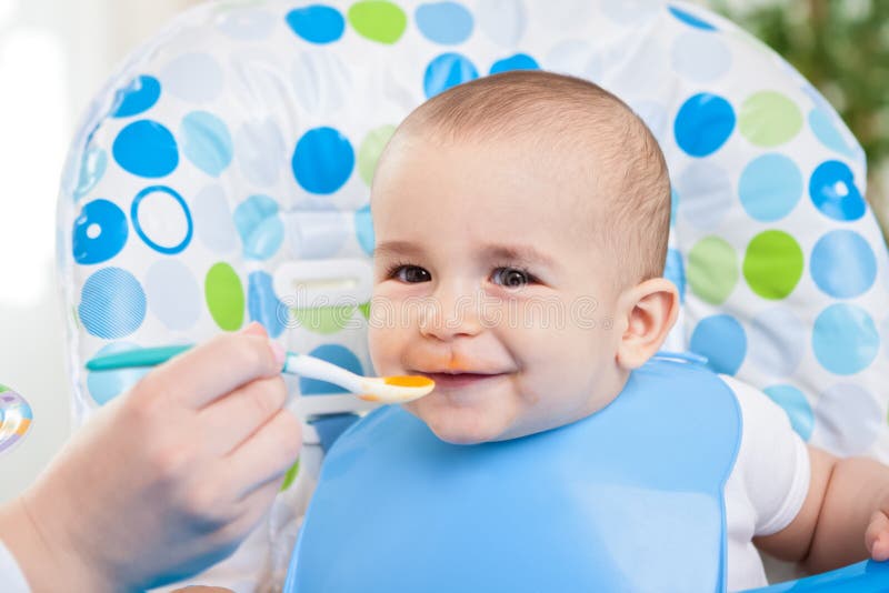 Adorable Smiling Cute Baby Eating Mash Stock Image - Image of innocence ...
