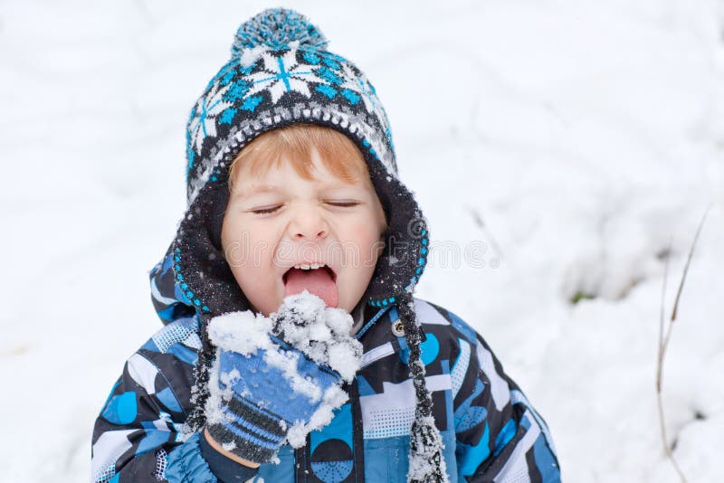Adorable Toddler Boy Having Fun with Snow Stock Image - Image of ...