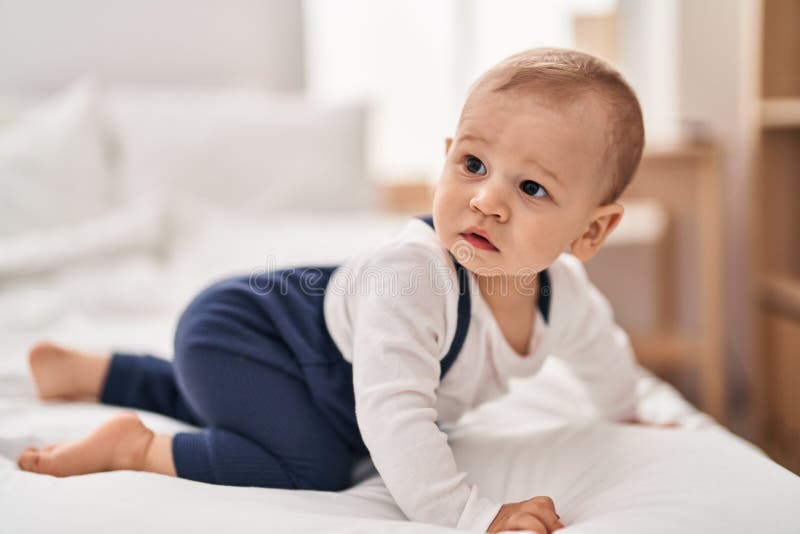 Adorable Toddler Crawling on Bed at Bedroom Stock Image - Image of ...