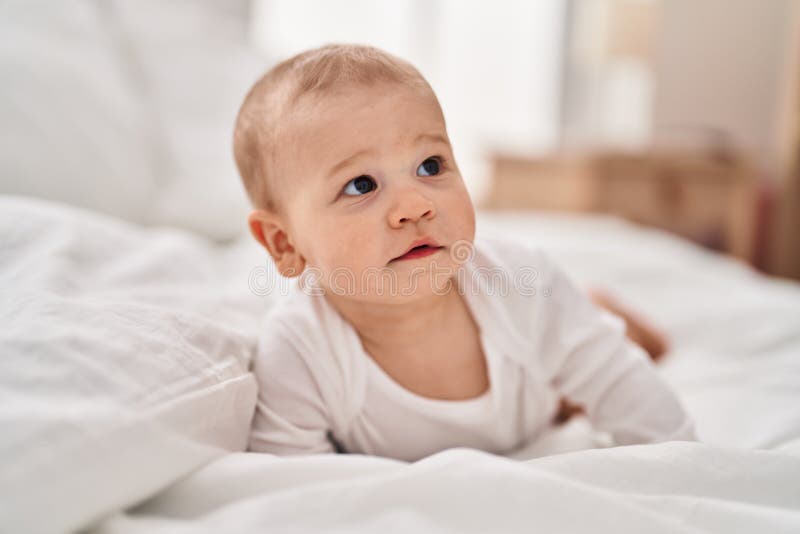 Adorable Toddler Crawling on Bed at Bedroom Stock Photo - Image of ...