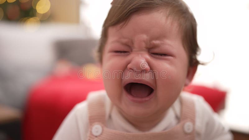 Adorable Toddler Sitting on Floor Crying at Home Stock Photo - Image of ...