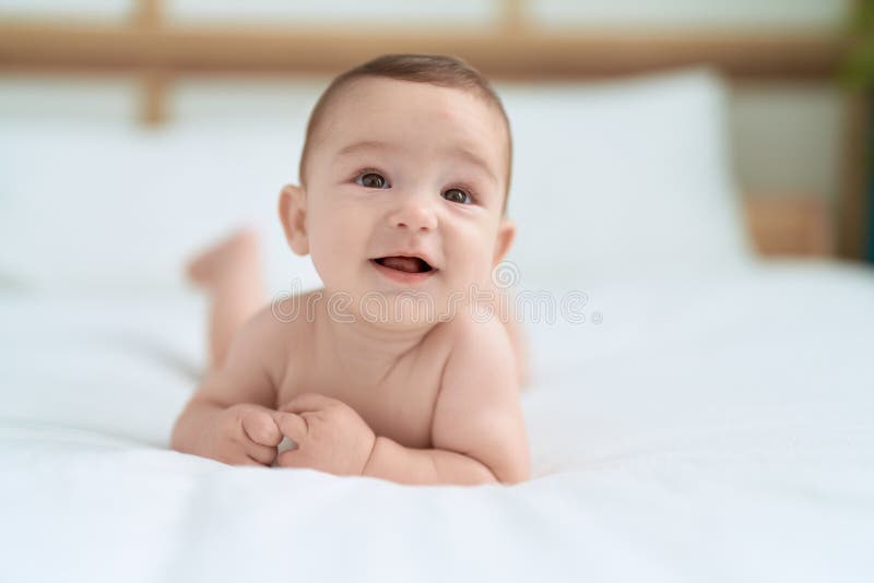 Adorable Toddler Smiling Confident Lying on Bed at Bedroom Stock Photo ...
