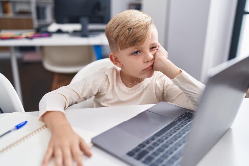 Adorable Toddler Student Boring Using Laptop Sitting on Table at ...