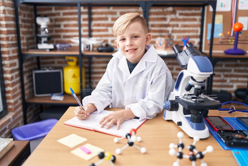 Adorable Toddler Student Smiling Confident Writing on Notebook at ...