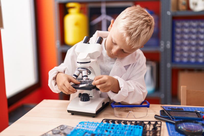 Adorable Toddler Student Using Microscope Standing at Classroom Stock ...