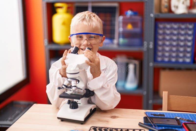 Adorable Toddler Student Using Microscope Standing at Classroom Stock ...