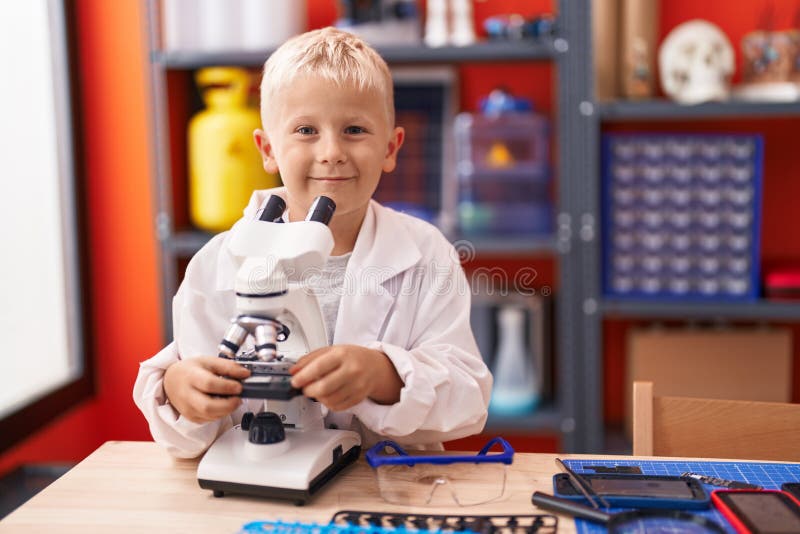 Adorable Toddler Student Using Microscope Standing at Classroom Stock ...