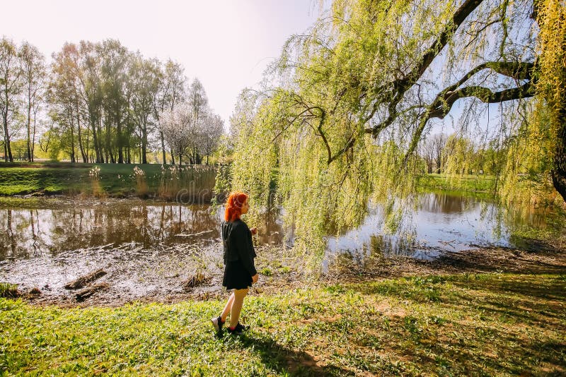 Adorable Young Girl Having Fun in a Spring Park in Sunny Day. Stock ...