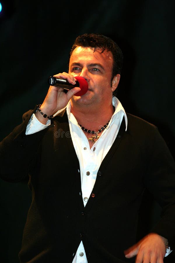 Adrian Enache Singing on a Stage in Front of the Spectators. Editorial ...
