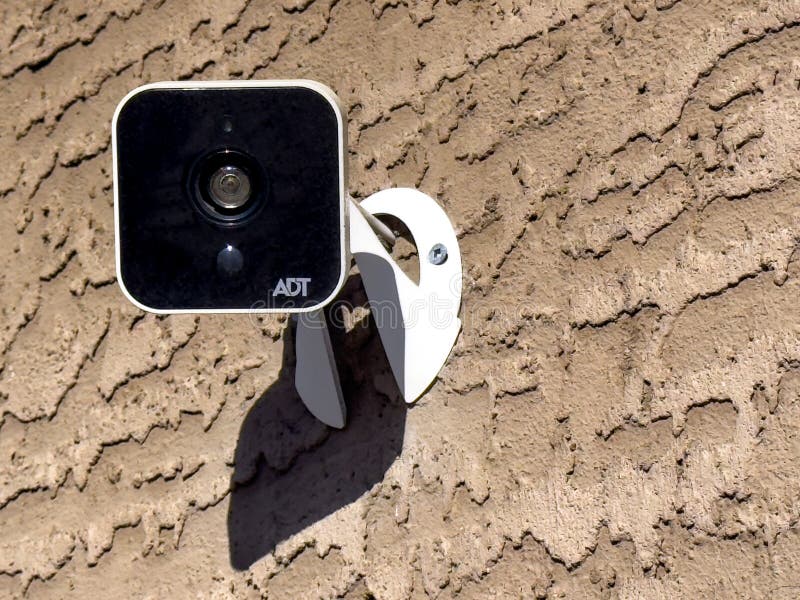 An ADT Security Camera Mount on a Wall Outdoors Editorial Image - Image ...