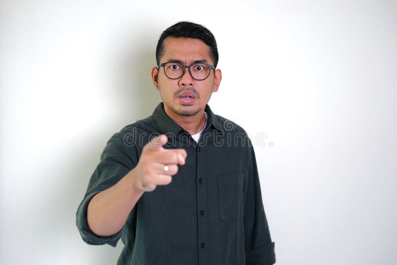 Adult Asian Man Pointing Forward with Confused Face Expression Stock ...