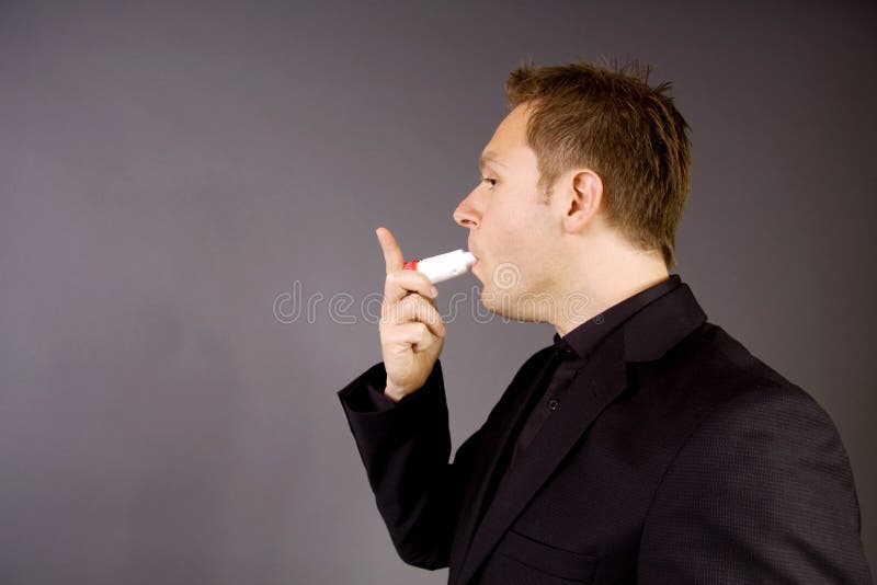 Adult with Asthma inhaler stock image. Image of asthmatic - 9333109