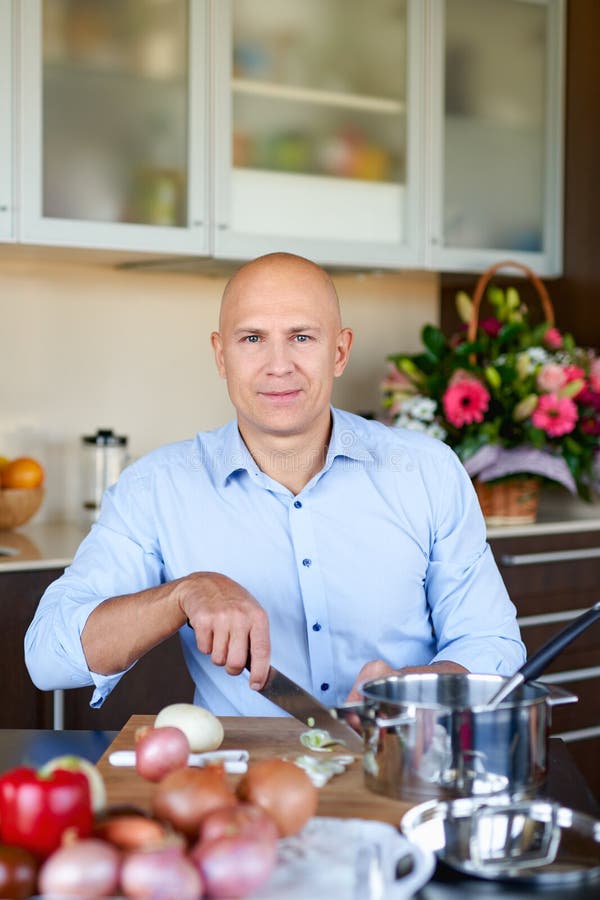 Adult Brutal Man in the Kitchen Preparing Food. Stock Photo - Image of ...