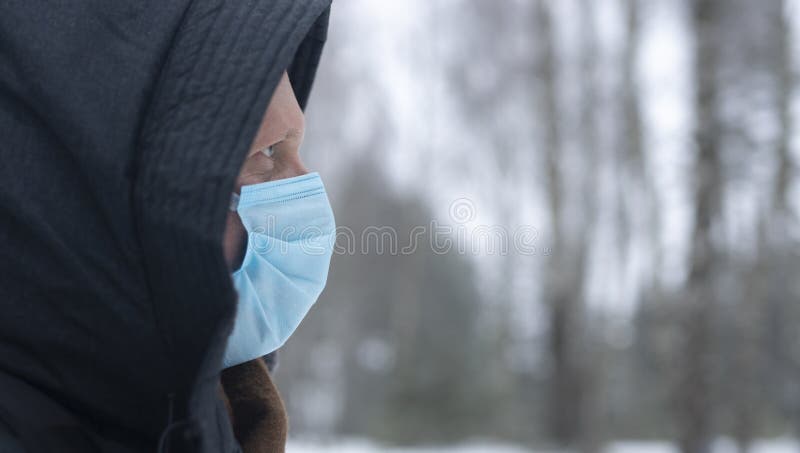 Adult Caucasian Man in Face Mask in Nature Alone Stock Photo - Image of ...