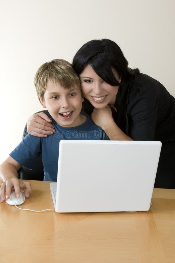 Adult and Child Enjoying Computer Time Stock Image - Image of online ...
