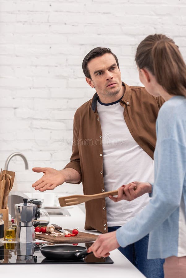 Adult Couple Having Argument at Kitchen Suring while Stock Photo ...