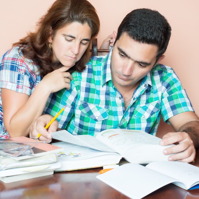 Adult Couple Studying at Home Stock Photo - Image of boyfriend ...