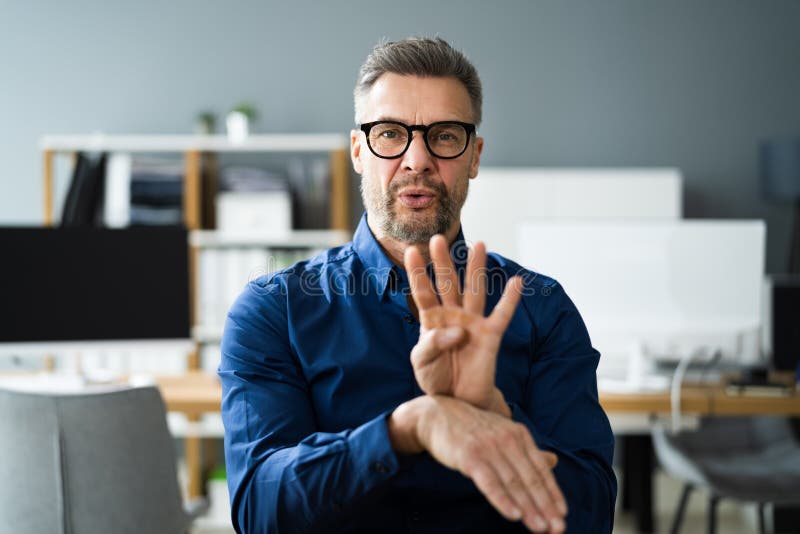 Adult Learning Sign Language Stock Photo - Image of home, language ...