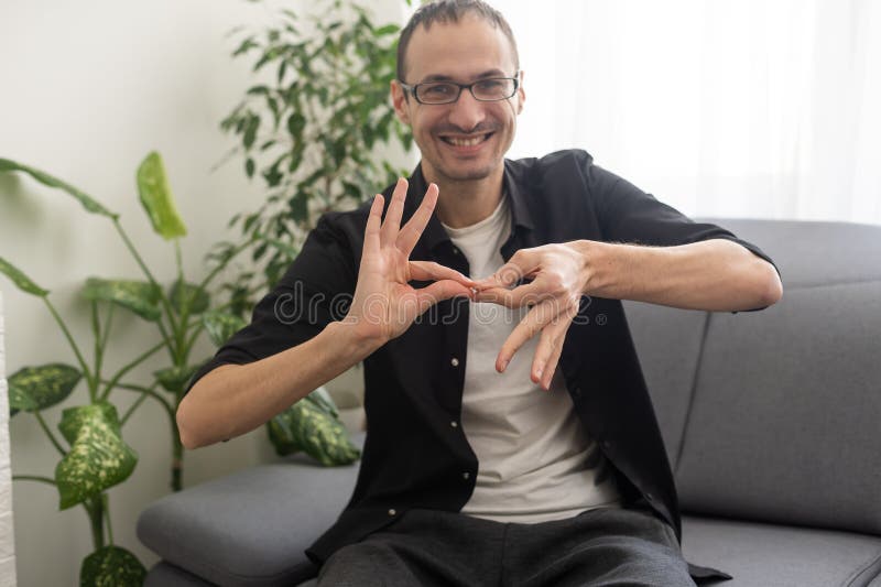 Adult Learning Sign Language for Deaf Disabled Stock Photo - Image of ... Adult Learning Sign Language for Deaf Disabled Stock Photo - Image of ...