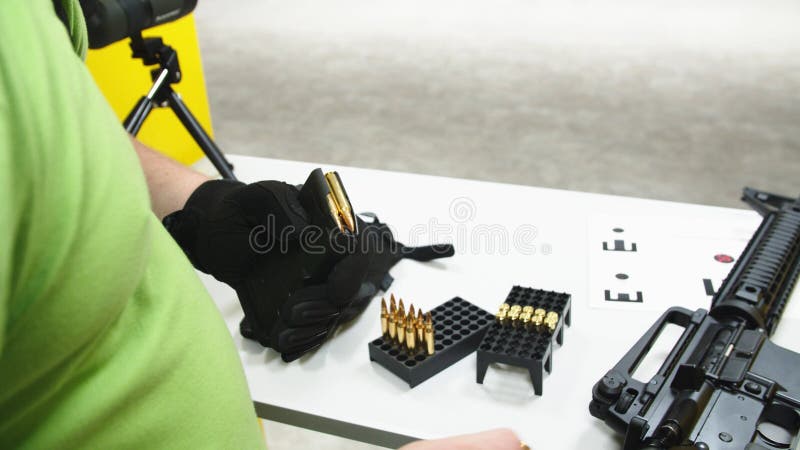 Man loading assault rifle stock photo. Image of semi - 29196004