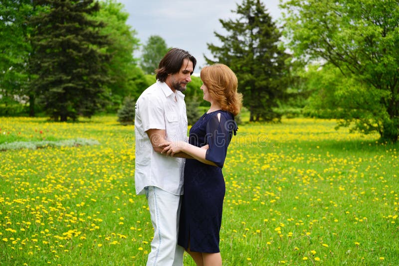 Adult Male and Female in Park Spring Stock Image - Image of charming ...