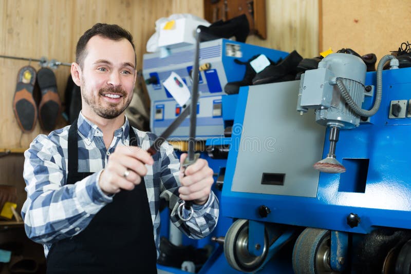 Adult Male Worker Sharpening Tools for Fixing Stock Image - Image of ...