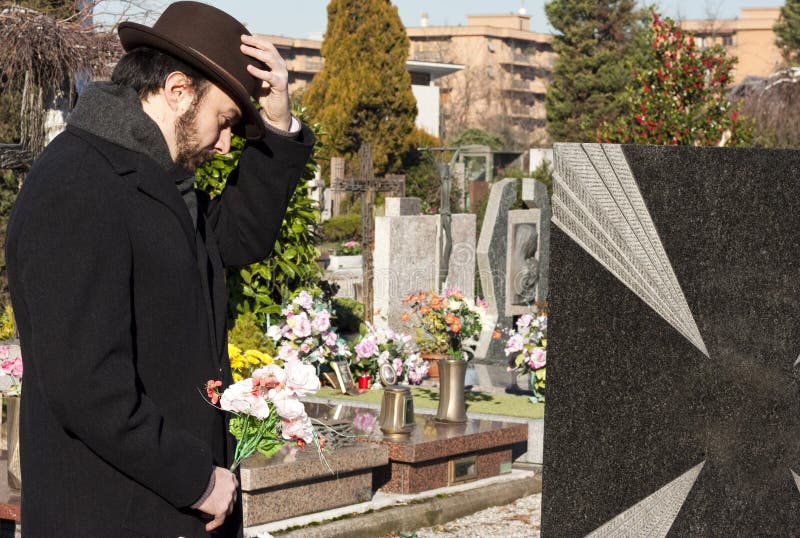 Grieving woman in cemetery stock image. Image of morning - 21881449
