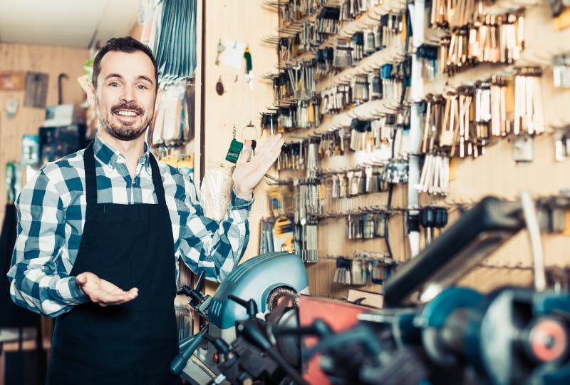 Adult Man Displaying His Tools for Making Keys Stock Image - Image of ...