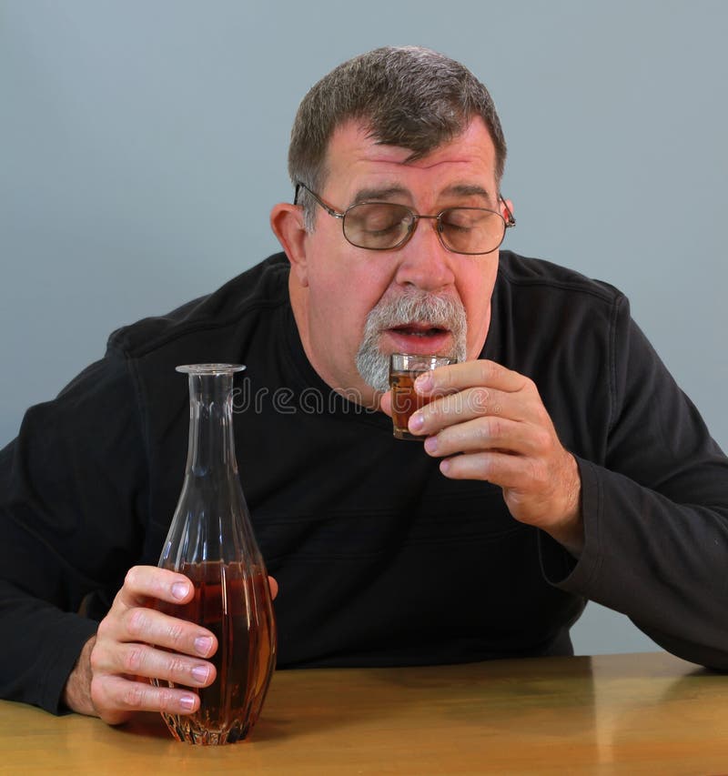 Adult Man Drinking Alcohol stock photo. Image of grasping - 29172622