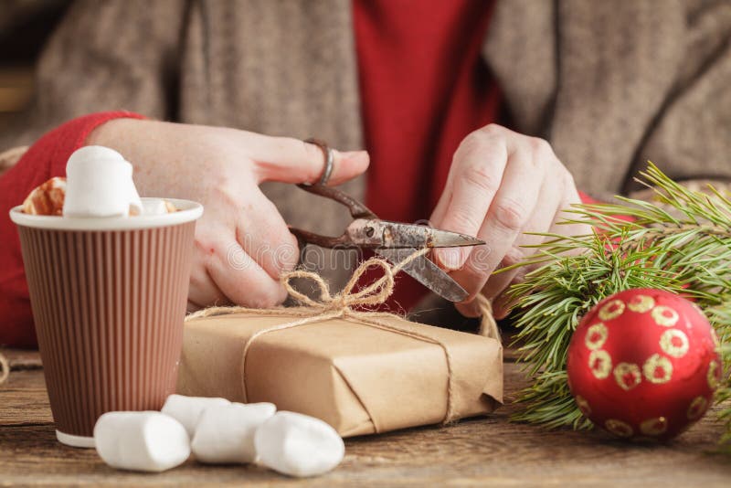 Adult Man Preparing Thread for Tying Xmas Gifts Stock Photo - Image of ...