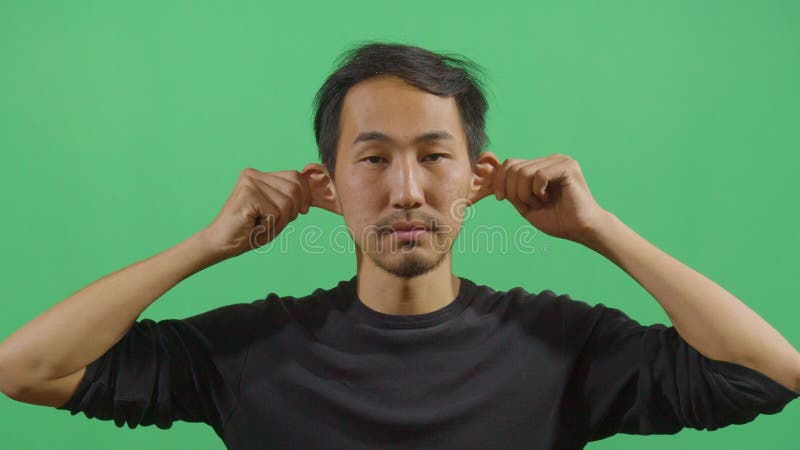 Adult Man Pulling His Ears stock video. Video of ecuador - 159181871