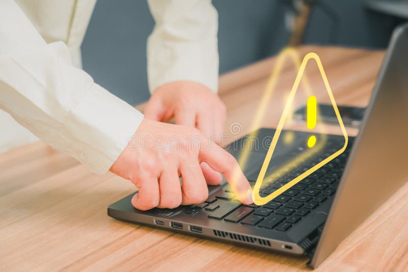 Adult Man Using Computer Laptop with Triangle Caution Warning Sign for ...