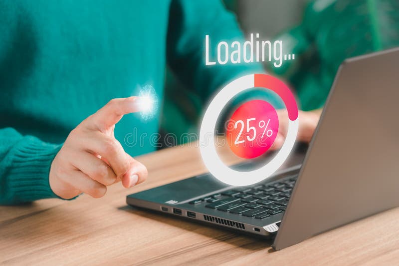 Adult Man Using a Laptop Computer for Download Software and Waiting To ...