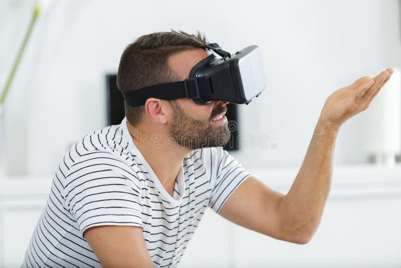 Adult Man Wearing Vr Goggles Stock Photo - Image of operation, goggles ...