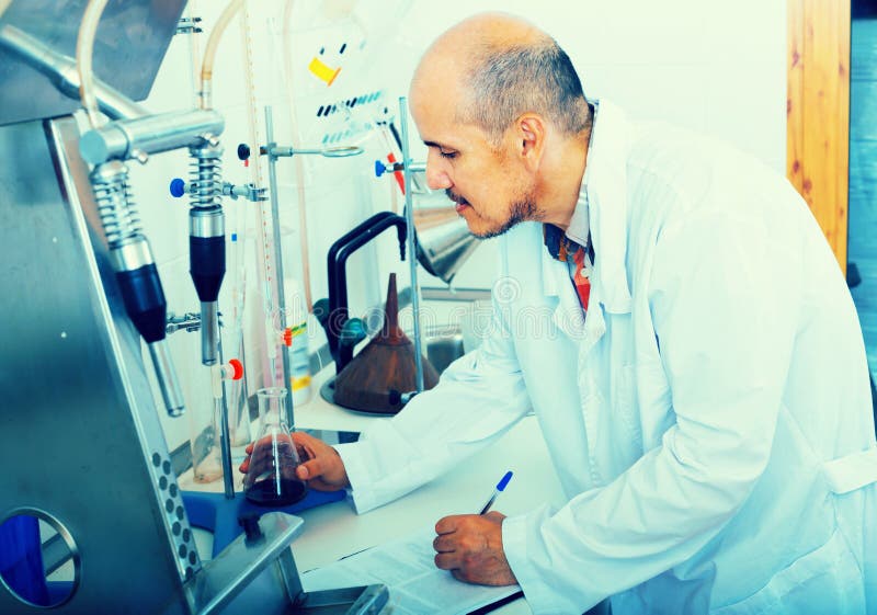 Adult Man in White Coat Making Tests Stock Image - Image of coloring ...