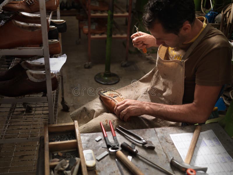 Adult Man Working in a Shoe Factory Stock Photo - Image of heavy, paste ...