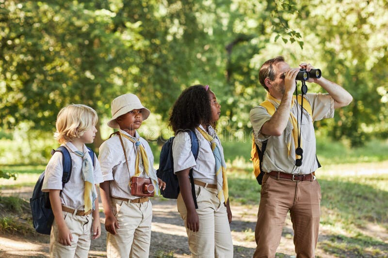 Adult Scout Leader Looking in Binoculars Stock Image - Image of woods ...