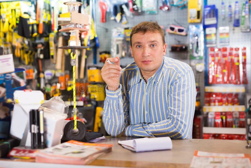 Adult Seller Man in Store is Trading Tools Stock Photo - Image of ...