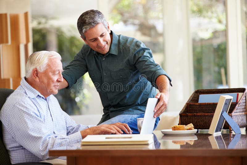 Adult Helping Two Young Children at Montessori/Pre Stock Photo - Image ...