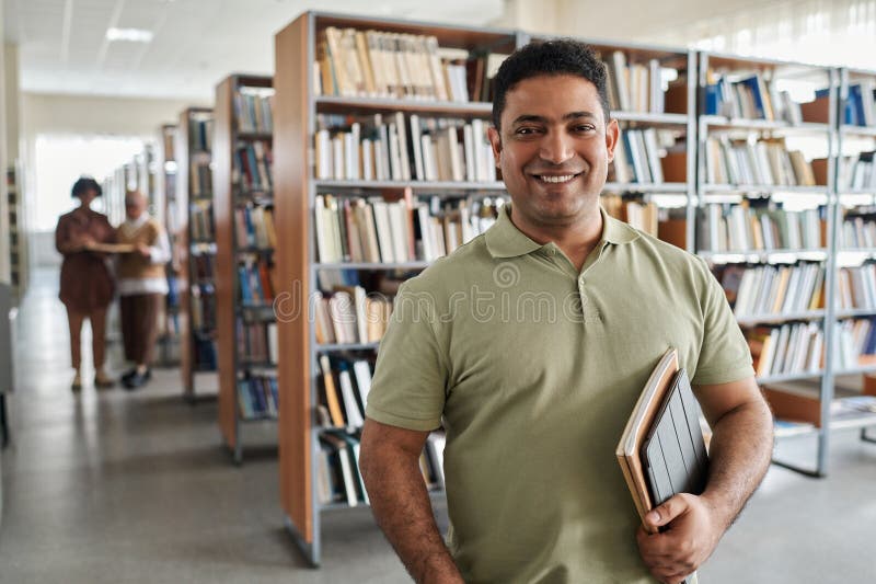 Adult Student Standing in the Library Stock Photo - Image of smile ...