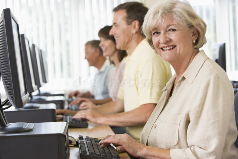 Adult Students on a Computer Stock Photo - Image of fifties, looking ...