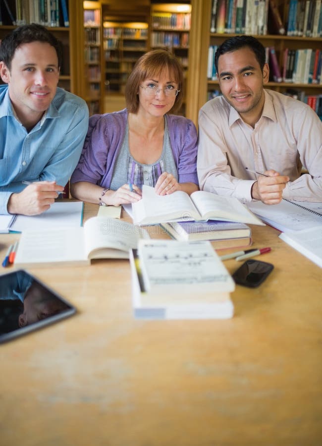 Adult Students Studying Together in the Library Stock Photo - Image of ...