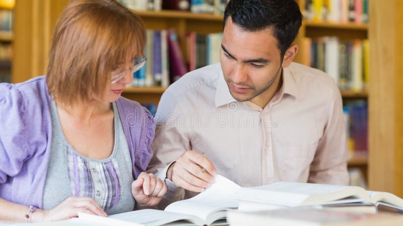 Adult Students Studying Together in the Library Stock Photo - Image of ...