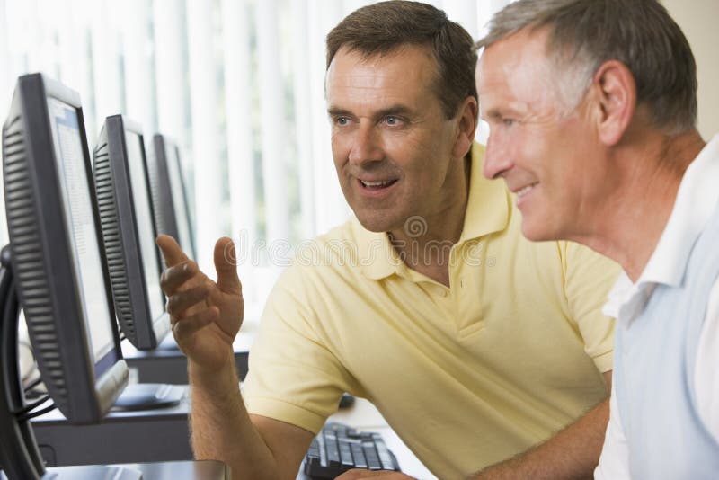 Adult Students Working on Computers Stock Photo - Image of cooperation ... Adult Students Working on Computers Stock Photo - Image of cooperation ...