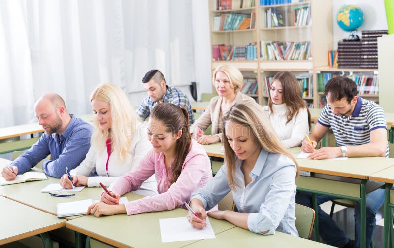 Students writing exam stock photo. Image of break, shirt - 51049634