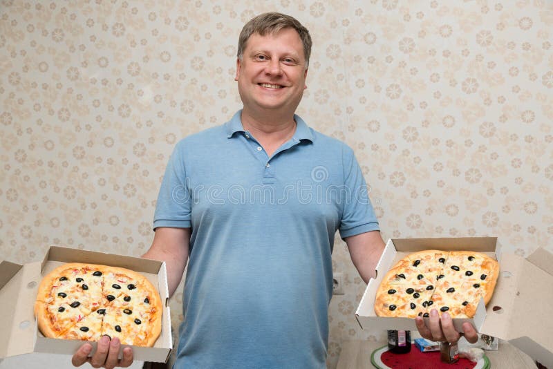 Adult Tall Man Smiling Broadly Holding Two Pizza Boxes Stock Photo ...