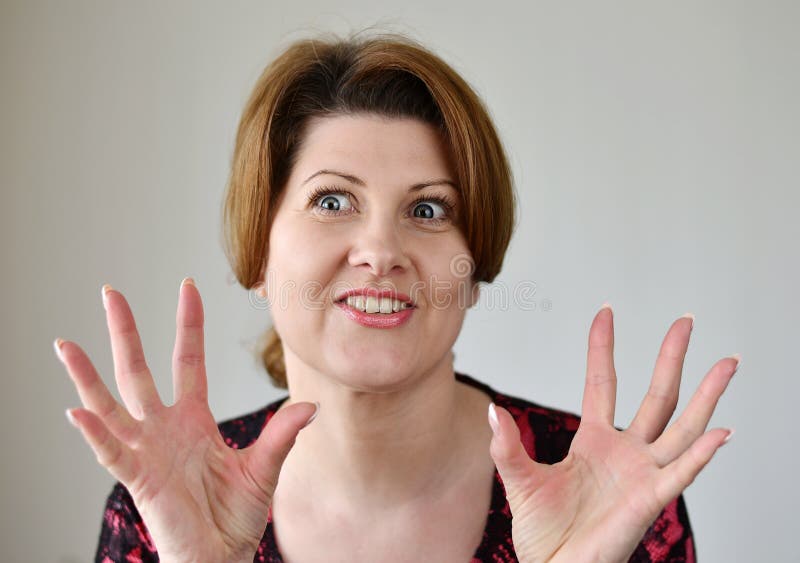 Adult Woman Imitating Fighting Activity on White Background Stock Photo ...