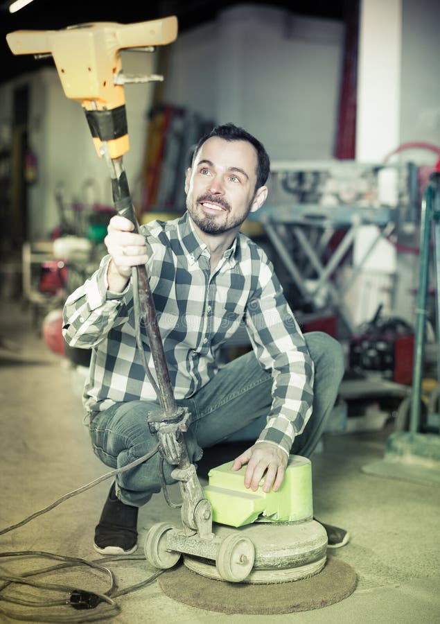 Adult Worker is Using Grinder for Construction Work Stock Photo - Image ...
